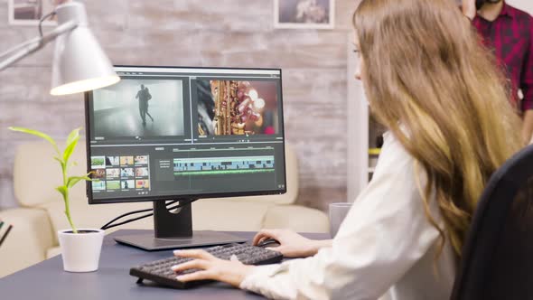 Creative Female Filmmaker Working on Post Production of a Movie, Stock ...