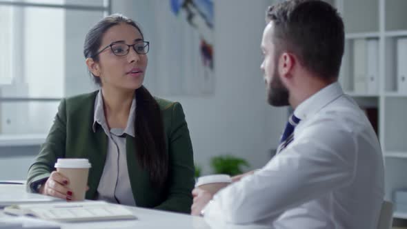 Coworkers Chatting and Drinking Coffee at Work, Stock Footage | VideoHive