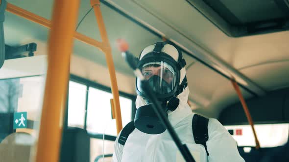 Disinfection Expert in a Hazmat Suit During Bus Decontamination, Stock ...