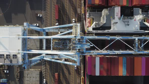 Top down View Of Port Crane And Cargo Containers At The Husky Terminal ...