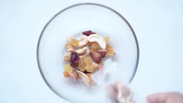 Close Up of Many Mixed Nuts Pouring in a Bowl, Stock Footage | VideoHive