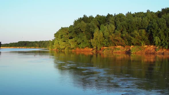 Panorama Of Siret River With Calm Waters And Lush Green Forest In The ...