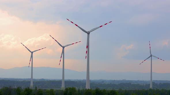 Modern windmills working in the wind in Austria, Stock Footage | VideoHive