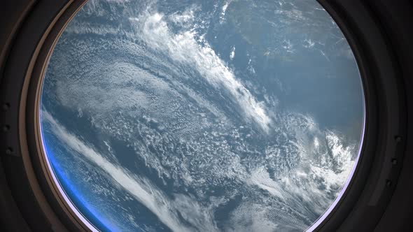 Earth As Seen Through Window Of Spaceship, Flight Of The Space Station ...