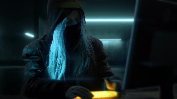 Young Anonymous Hacker Woman with Mask. Thief Is Stealing Data From ...