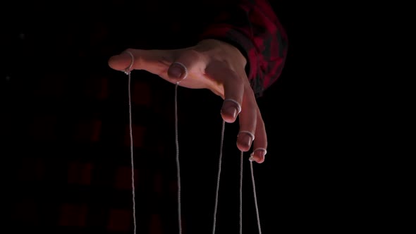 Man Holding a Puppet String, Stock Footage | VideoHive
