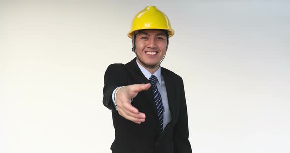 Asian Engineer with Handshake Gesture, Stock Footage | VideoHive