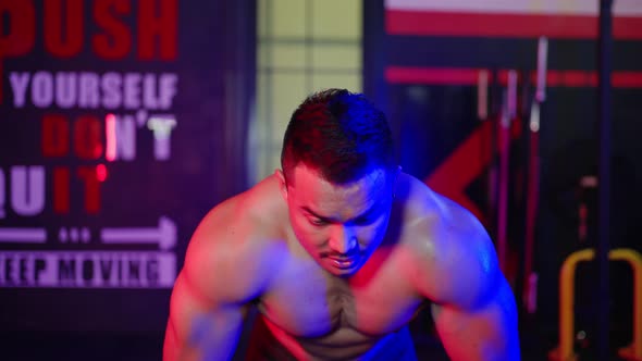 Active Sport male Bodybuilder or athlete showing muscles and take ...