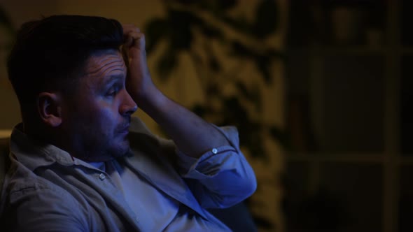 Man Crying During Movie in Dark Room, Stock Footage | VideoHive