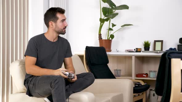 Nervous Gamer Playing a Video Game on the Console, Stock Footage ...