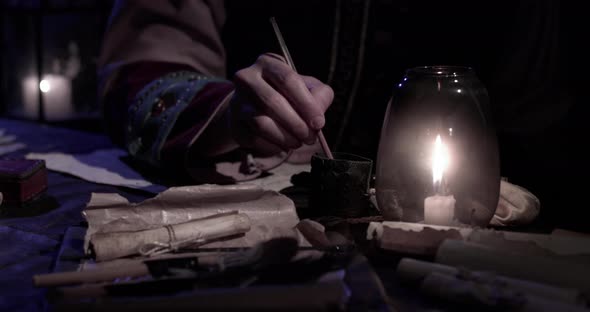 Writing by candlelight., Stock Footage | VideoHive