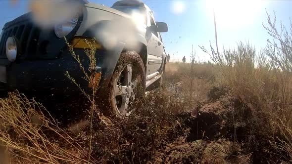 Closeup Moving Suv Driving Along Sandy Road Side View, Stock Footage