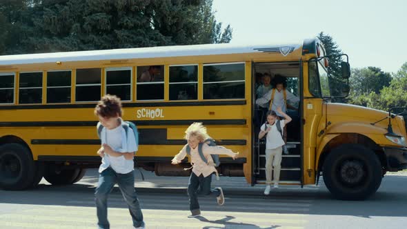 Smiling Students Leaving Yellow School Bus, Stock Footage | VideoHive