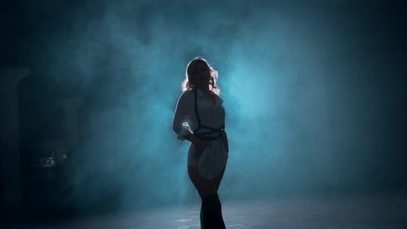 Woman dancing in the fog, Stock Footage | VideoHive