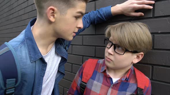 School Hooligan Taking Away Glasses From Insecure Student, Mocking Nerd ...