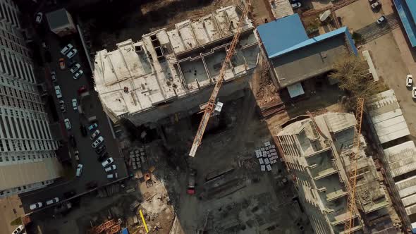 Top View Zoom Out of Construction Site During Work Hours, Stock Footage