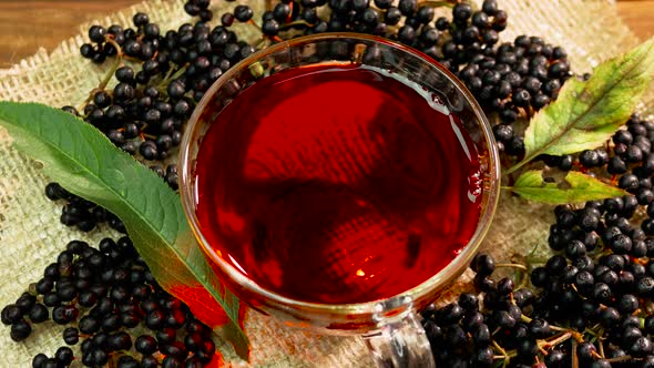 Top View Natural Red Berry Tea In A Glass Cup On A Turntable. Berry Tea ...