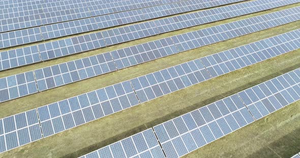 4K Aerial footage of photostatic solar farm. Solar farm power station ...