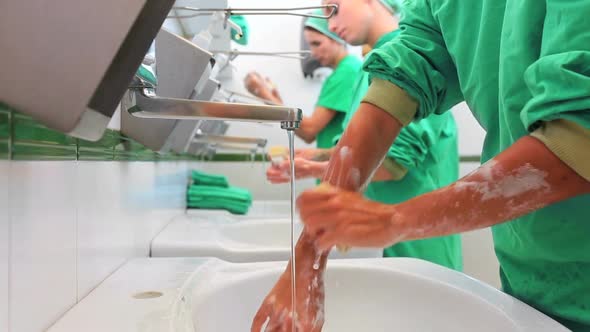 Hospital staff washing hands and forearms, Stock Footage | VideoHive
