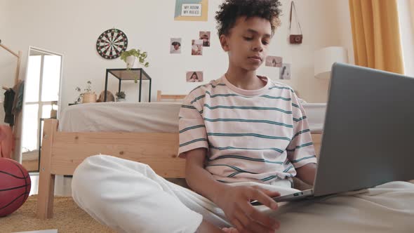 Teenager Using Laptop at Home, Stock Footage | VideoHive