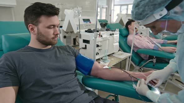 Nurse Drawing Blood from Donor at Hospital, Stock Footage | VideoHive
