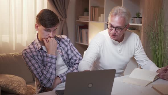 Teaching Father Study Together Son Homework Home, Stock Footage | VideoHive