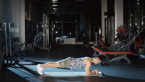 Sportsman Doing Plank Pose Cardio Workouts on Floor Fitness Mat in Gym ...