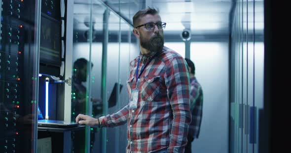 Bearded IT Specialist Setting Servers in Data Center, Stock Footage