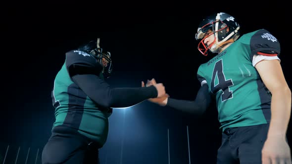 Two American Football Players Shaking Hands Before a Game, Close Up ...