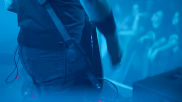 Shot From Behind a Rock Musician Performing in Front of an Audience ...