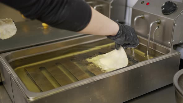 Cooking Oil Boiling and Bubbling in Fryer for Deep Frying Dishes in a ...