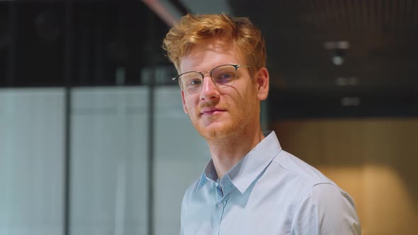 Young Ginger Irish Man in Glasses Crossing Hands on Chest Portrait ...