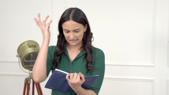 Confused Indian girl writing, Stock Footage | VideoHive