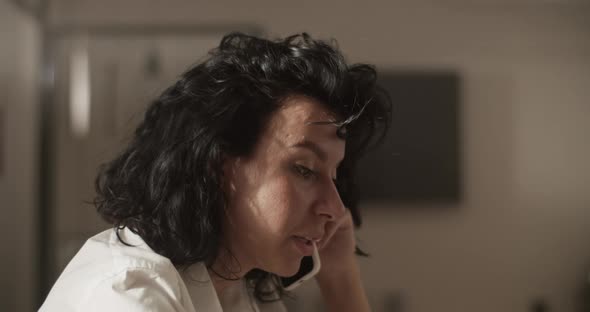 Woman Discussing Architectural Drafts During Phone Call, Stock Footage