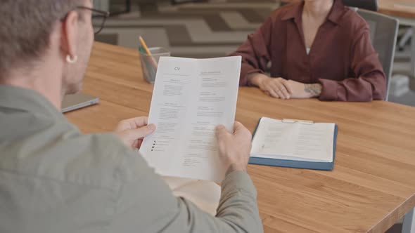 Applicant Handing CV to Employer at Interview, Stock Footage | VideoHive