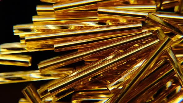 Bugle gold on a black background. Gold beads. Rotation., Stock Footage