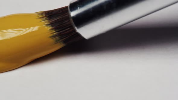 Brush Painting with Yellow Color Closeup Art Concept, Stock Footage