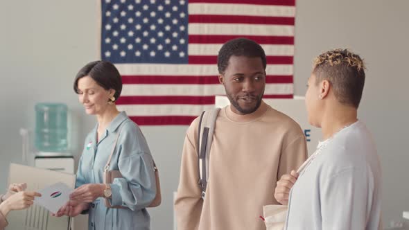 Diverse People Talking in Queue at the Voting Station, Stock Footage