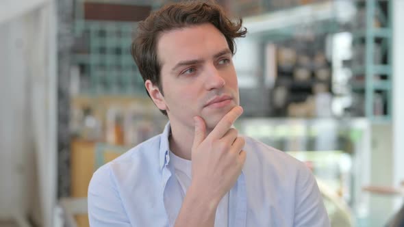 Portrait of Pensive Creative Man Thinking Getting Idea, Stock Footage