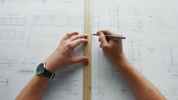 Engineer's hands drawing a construction plan, Stock Footage | VideoHive