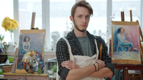 Portrait of Creative Young Man Artist Standing in Painting Studio ...