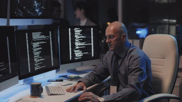 IT Department Manager Posing in Dark Office, Stock Footage | VideoHive