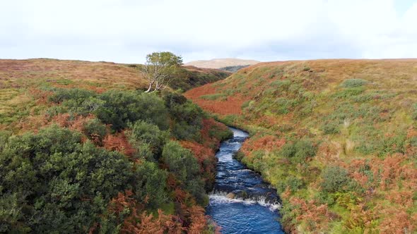 Scottish Highland river on a beautiful grassy field., Stock Footage