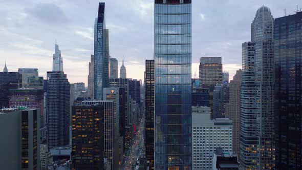 Sliding Reveal of Long Straight Avenue Between Tall Modern Downtown ...