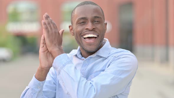 Outdoor Portrait of Appreciative Young African Man Clapping , Stock Footage