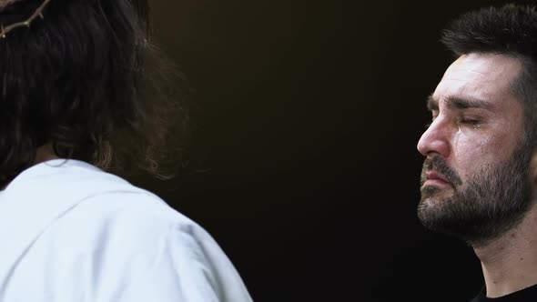 Christ Hugging Crying Man, Stock Footage | VideoHive