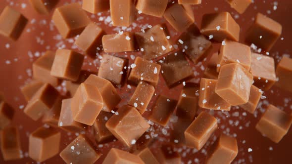 Super Slow Motion Shot of Salted Caramel Explosion Towards Camera at ...
