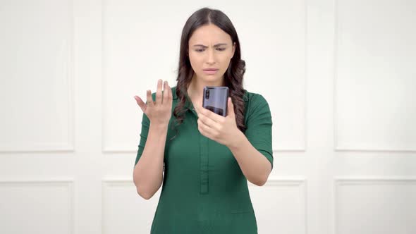 Sad Indian woman talking on a video call, Stock Footage | VideoHive