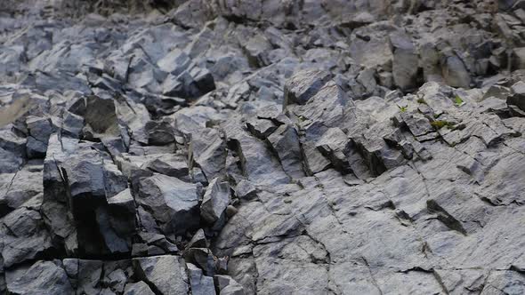 Old Dark Rocks With Sharp Edges From Water Erosion, Stock Footage ...