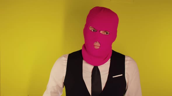 Man in Pink Balaclava with Baseball Bat, Stock Footage | VideoHive